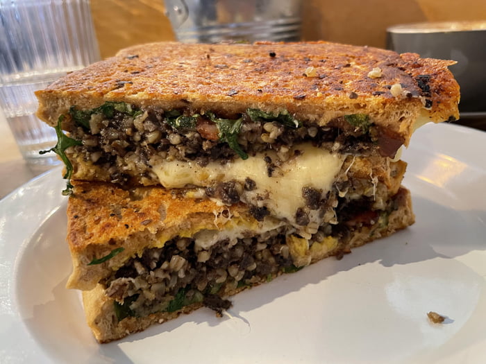 Haggis, cheese, mustard, rocket and caramelised onion toastie - 9GAG