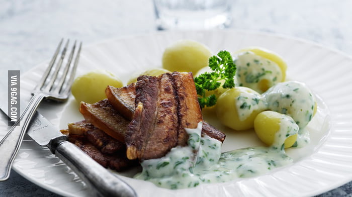 Danish national dish "stegt flæsk med persillesovs" (crispy pork with ...