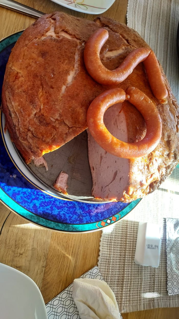 That's how germans celebrate birthday. Yes, it's a meat cake with ...
