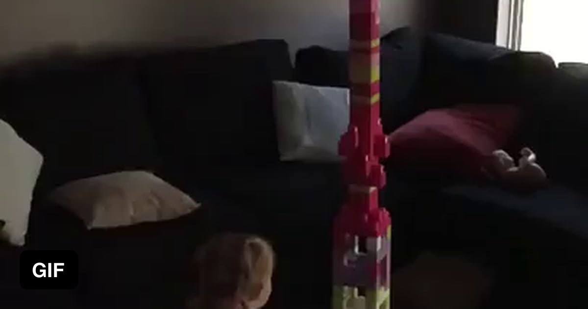 Kid pushes over a block tower - 9GAG