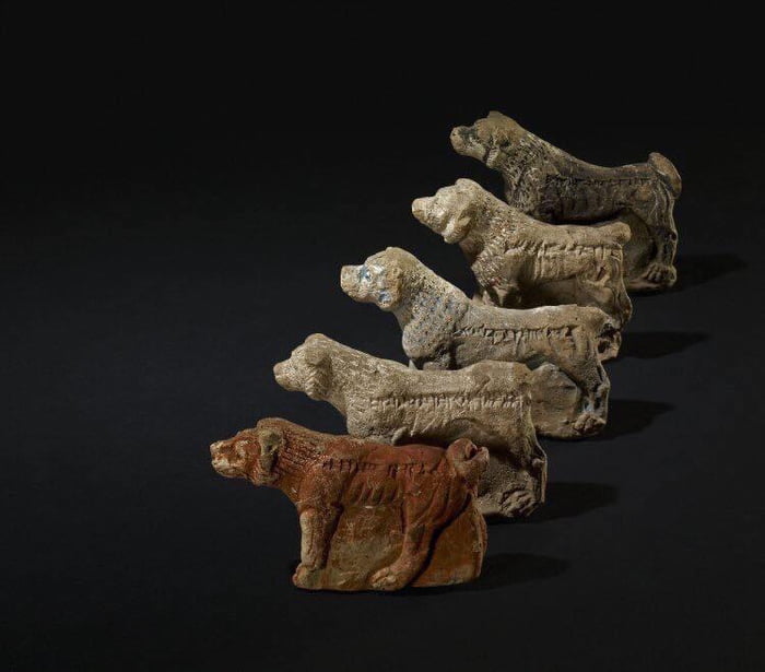 Assyrian dog figurines from 650BC, with names carved on them: - 9GAG
