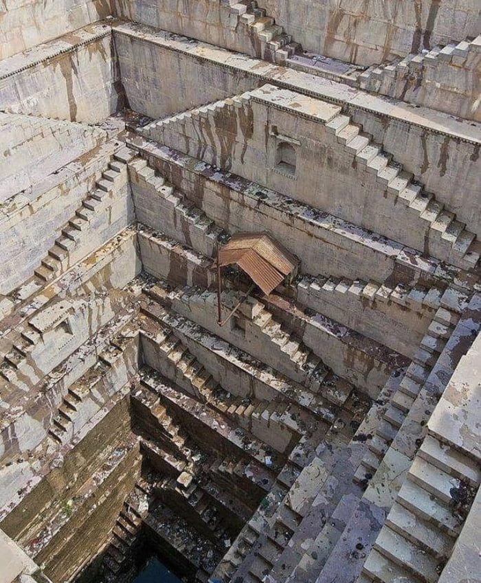 A step well located in Rajasthan, India. Step wells are wells or ponds ...