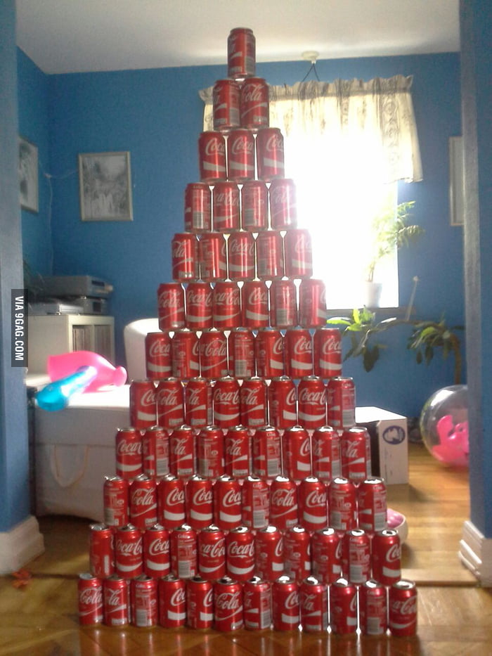 Me and my 5 year old cousin built a tower out of empty cans - 9GAG