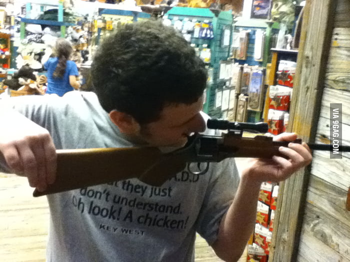 My friends first time holding a gun. He's not the smartest cookie. - 9GAG
