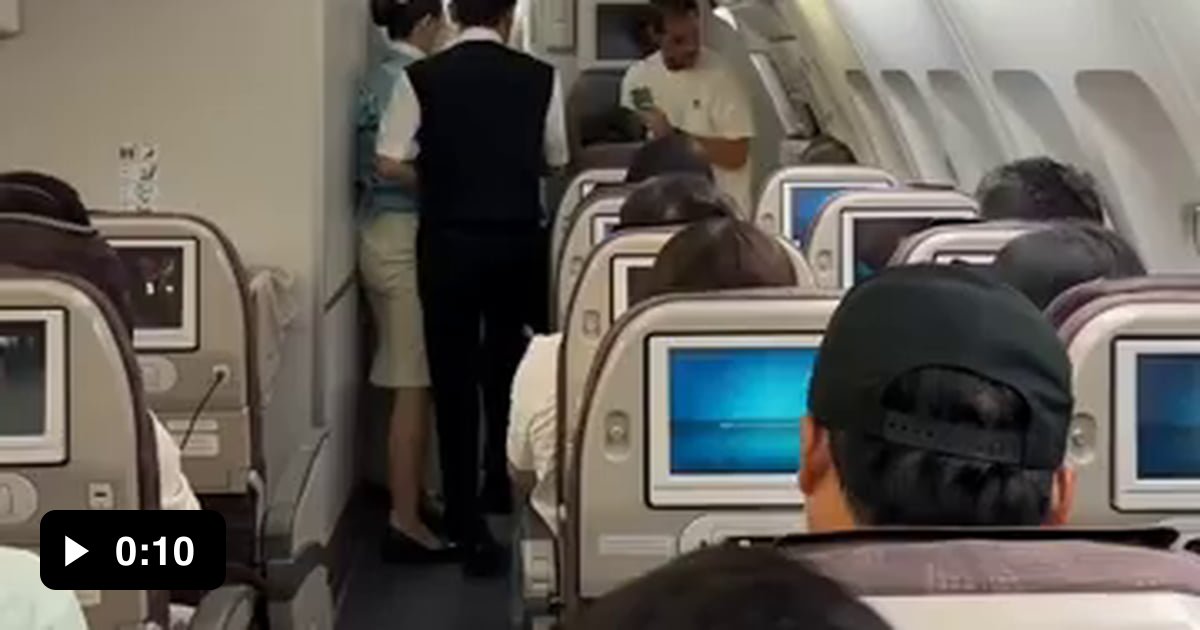 Korean Air passenger tries to open emergency exit during flight...again - 9GAG