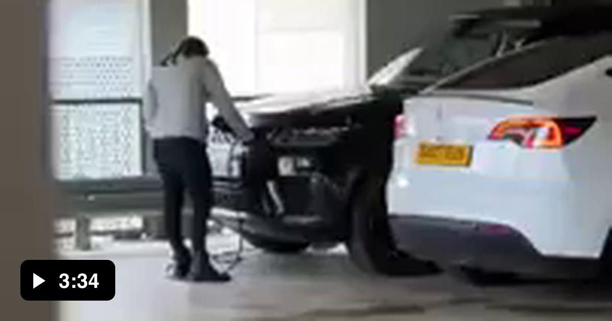 Stealing his charge because hers is 100% Tesla electric and his is a ...