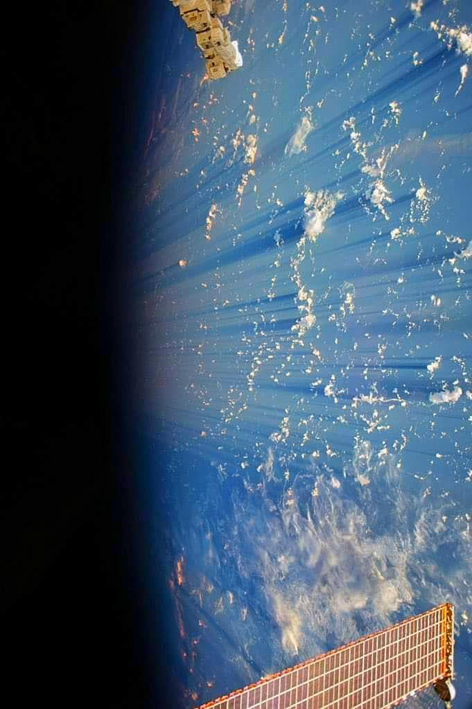 Clouds casting shadows thousands of miles long, captured by the ISS - 9GAG
