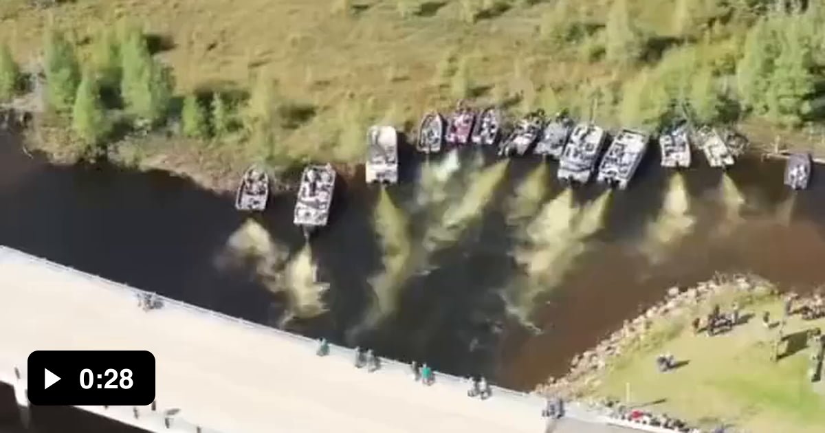 Boat owners moving a large floating island out of the way on Wisconsin ...