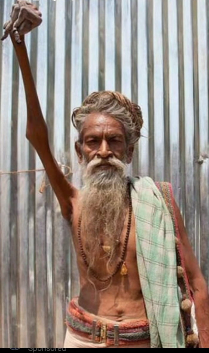 Man from India raises arm for over 45 years - 9GAG