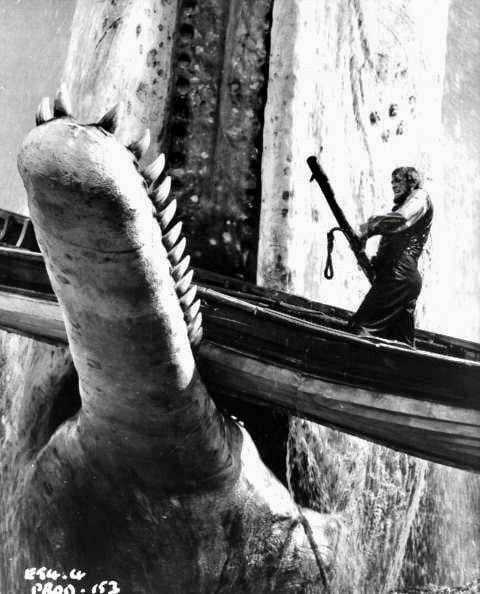 Gregory Peck as Captain Ahab films a fight scene against the whale in ...