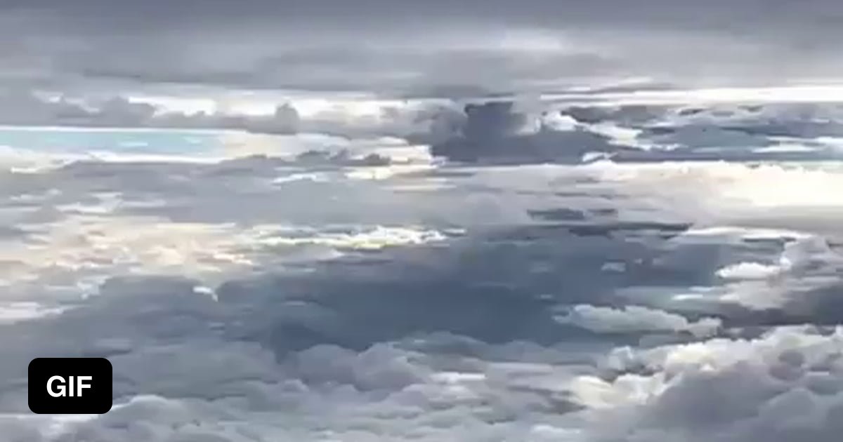 Flying between clouds. - 9GAG
