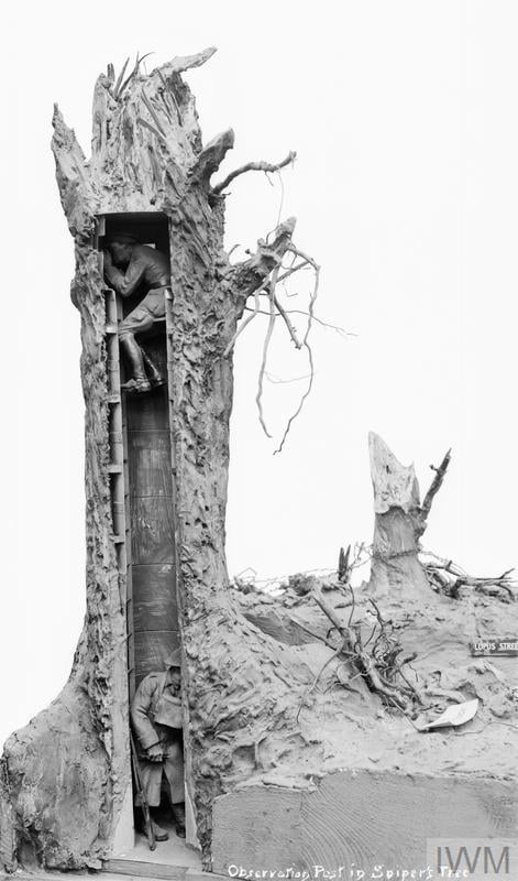 A model of a sectioned observation post with an artillery observer. The ...