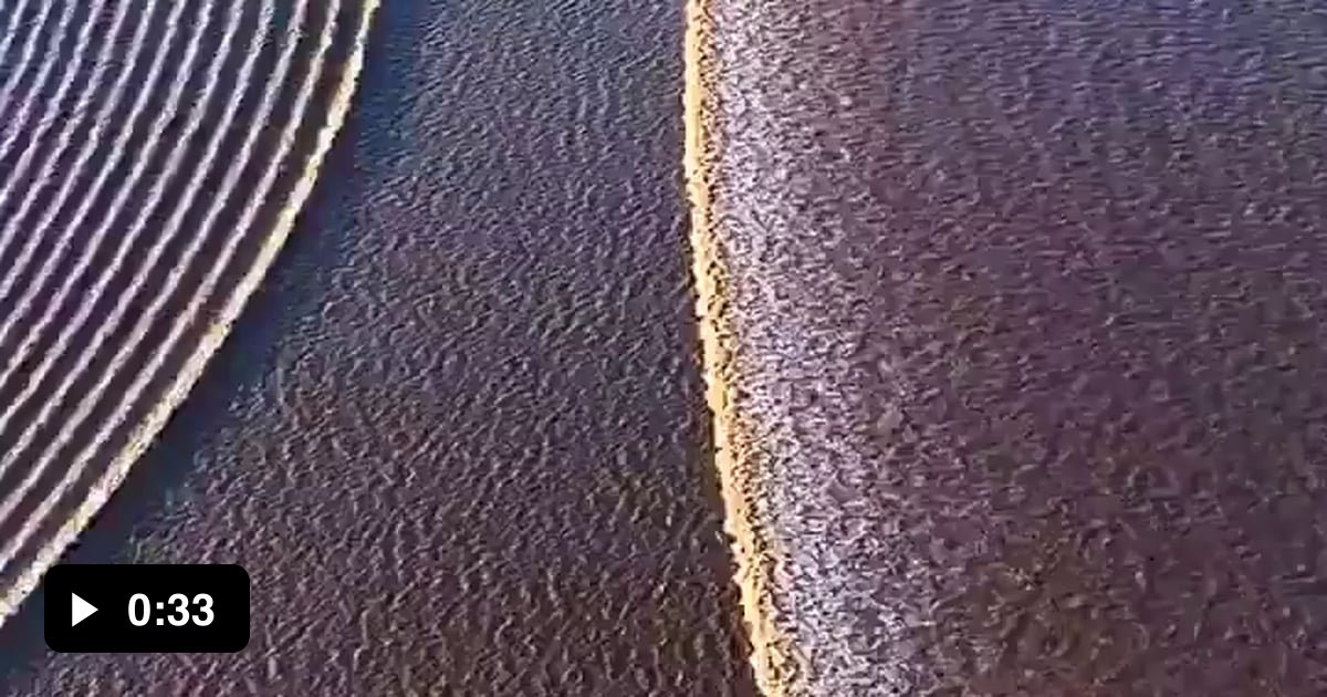 Aerial view of a Tidal Bore on the Qiantang River - a phenomenon in ...