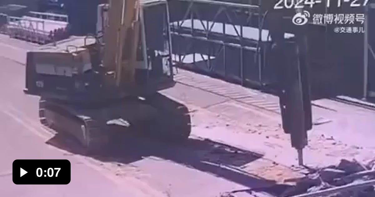 Construction worker breaking up the road. - 9GAG