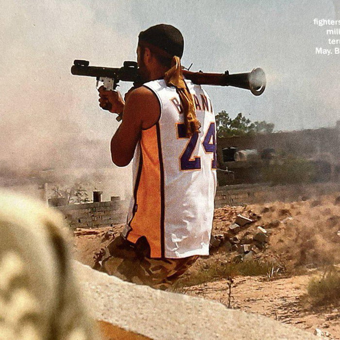 Libyan fighter fires an RPG at IS fighters wearing a Kobe Jersey - 9GAG