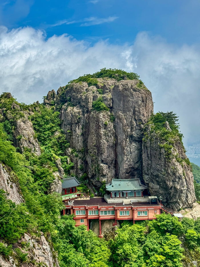 Finding serenity among the clouds and cliffs. - 9GAG