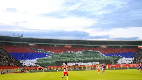 Red Star fans display a tifo with the Serbian flag, a tank T-84 and an ...