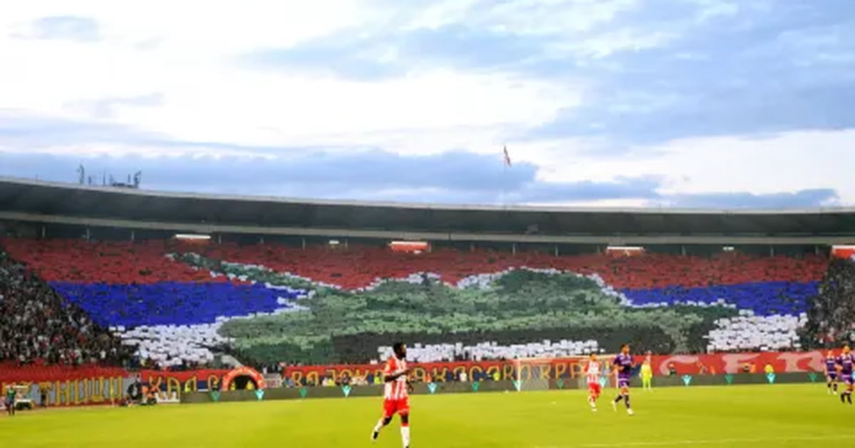 Red Star fans display a tifo with the Serbian flag, a tank T-84 and an ...
