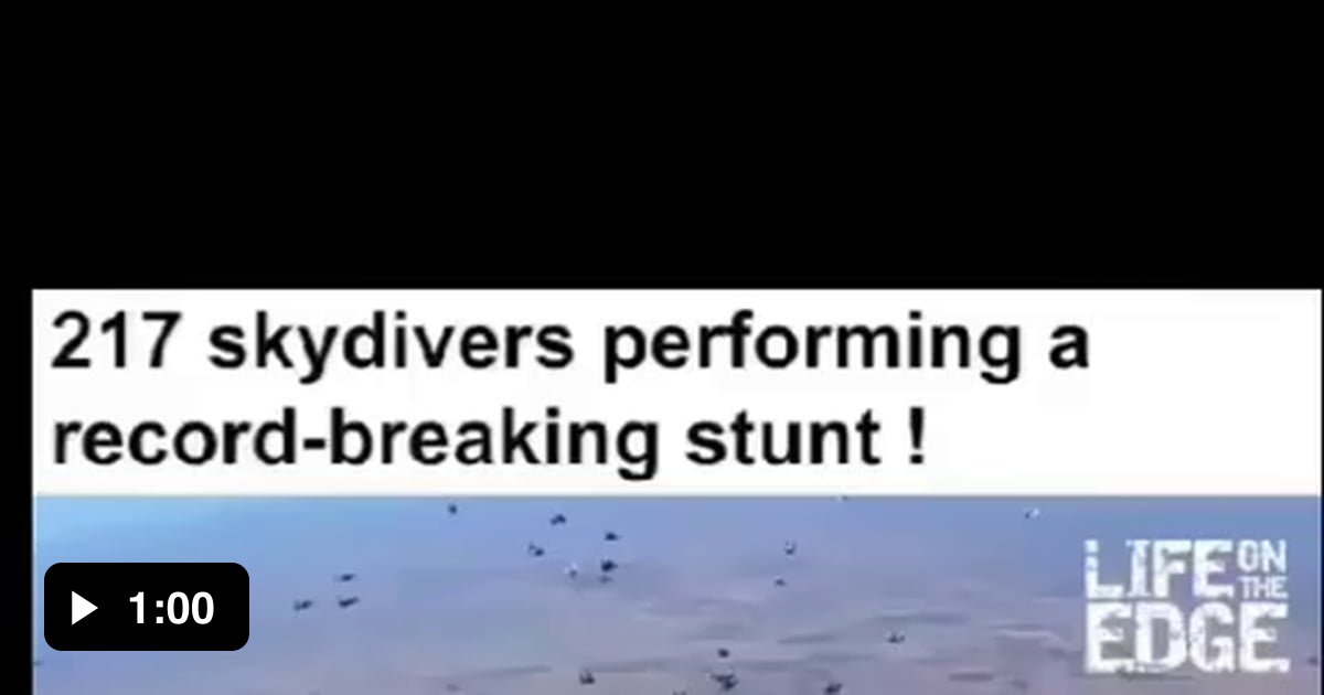 217 skydivers make beautiful pattern. - 9GAG