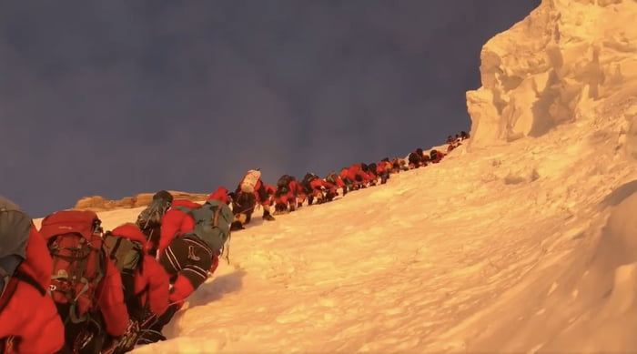 Bottleneck on the second highest mountain K2 as 100 climbers summit the ...
