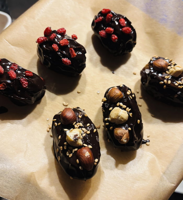 Homemade date pralines filled with peanut butter and hazelnut butter. 🍫 ...