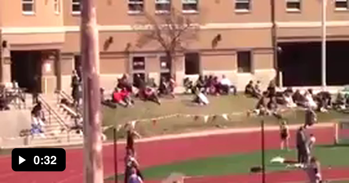 A dog ran onto the track during a high school relay race and covered ...