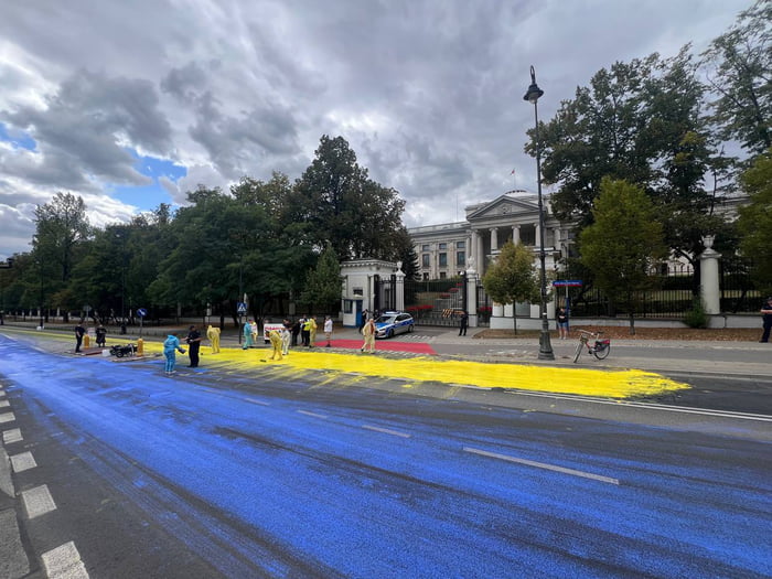 Polish activists painted a road near the russian embassy in Warsaw to ...