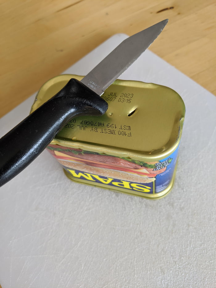 To make it easier to get Spam out, poke a little hole in the bottom ...