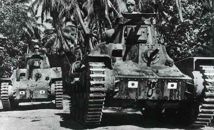Imperial Japanese Army Type 95 Ha-Go tanks make their way through the ...