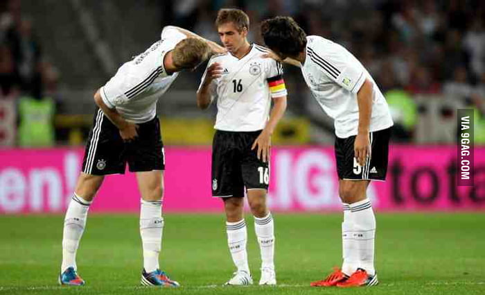 Germany's central defenders (6'4 and 6'6) bending down to talk to their ...