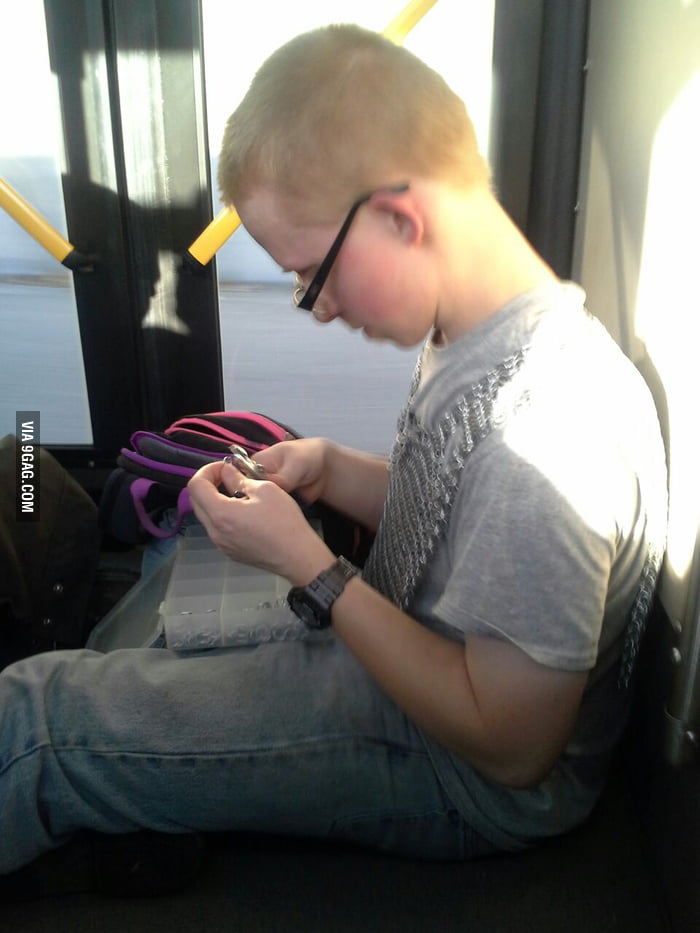 Kid on the bus is wearing chainmail and adding pieces to it - 9GAG