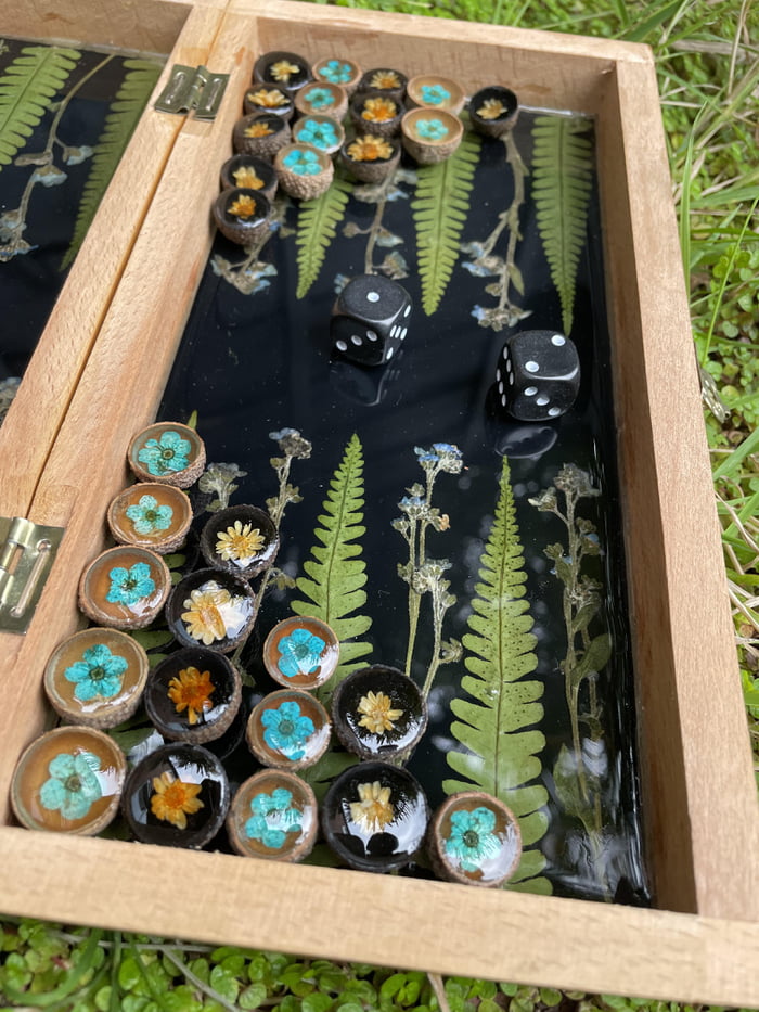 Tiny game counters made out of tiny flowers inside of tiny acorns. - 9GAG