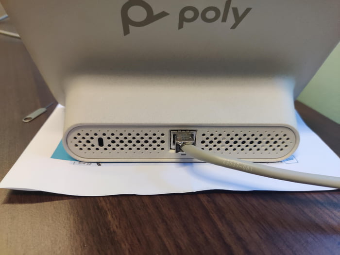 One of these holes on a Poly TC8 Tablet is the hard reset button. - 9GAG