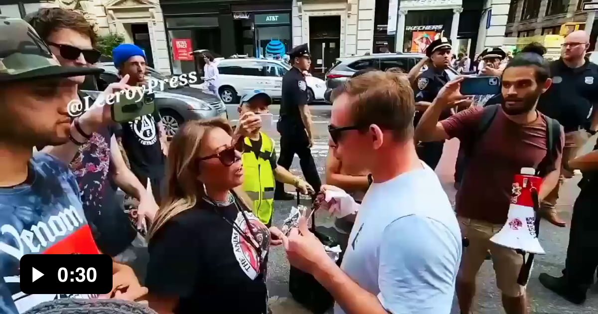 Man eating and licking beef kebab right in front of angry animal rights ...
