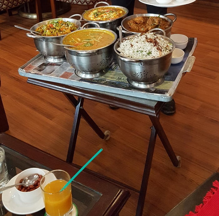 Indian dinner time. butter chicken, paneer curry, rice and veggies. 5 ...