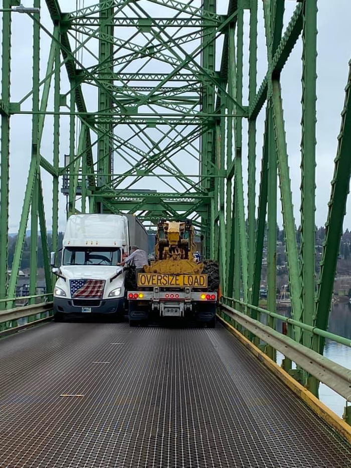 Ignored the wide load restrictions, and now stuck on a mile long bridge ...