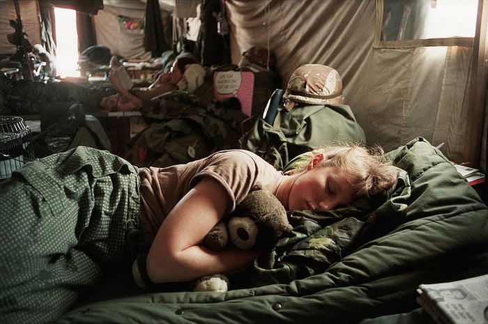 Exhausted U.S. Army nurse Amy Stuart, 5th MASH unit in Saudi Arabia ...