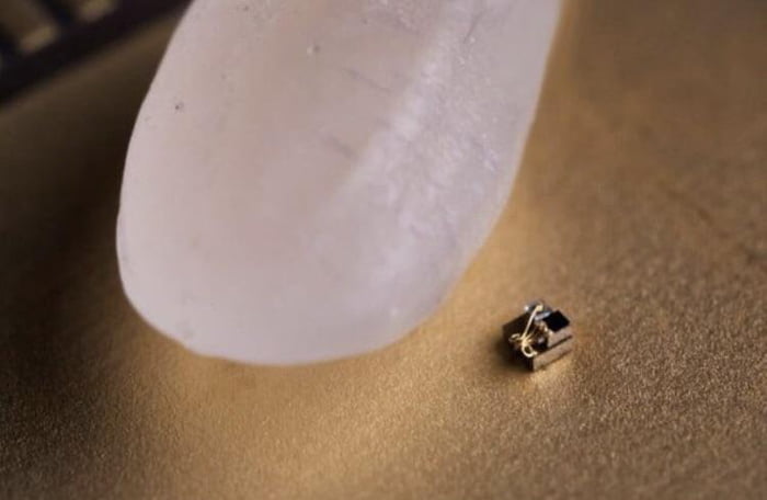 Worlds smallest computer next to a grain of rice - 9GAG