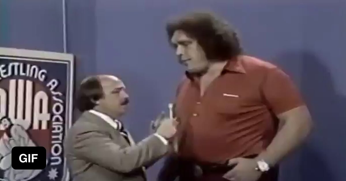 Andre the Giant's hand compared to a regular person's - 9GAG
