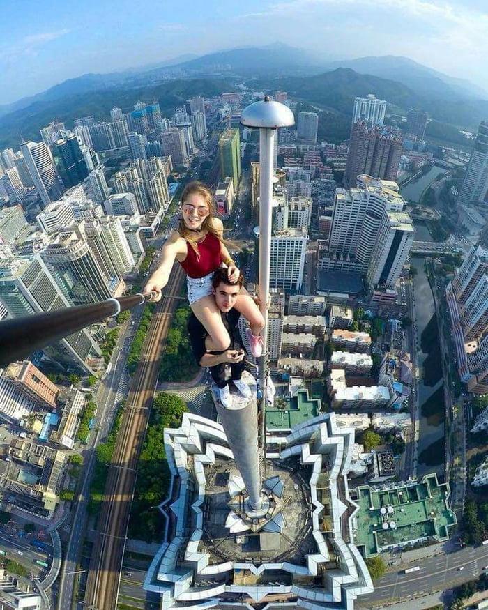 - Angela Nikolau, the world’s riskiest selfie taker. - 9GAG
