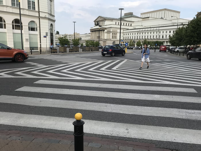 Confusing zebra crossing and street markings in Warsaw, Poland. - 9GAG