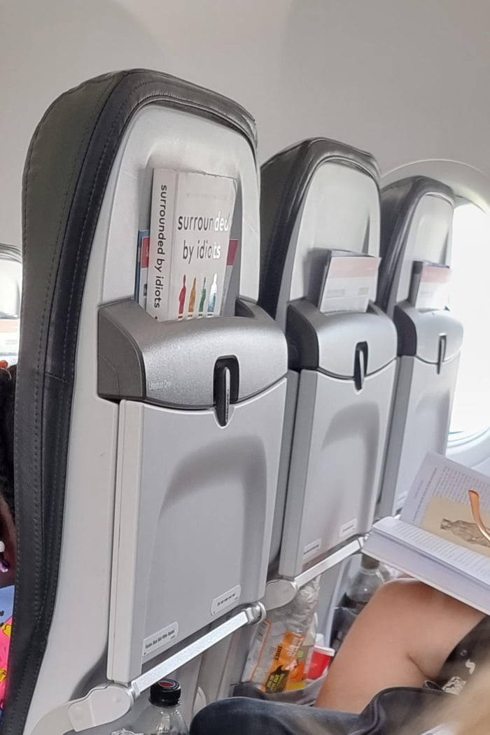 Interesting book choice for a flight... - 9GAG