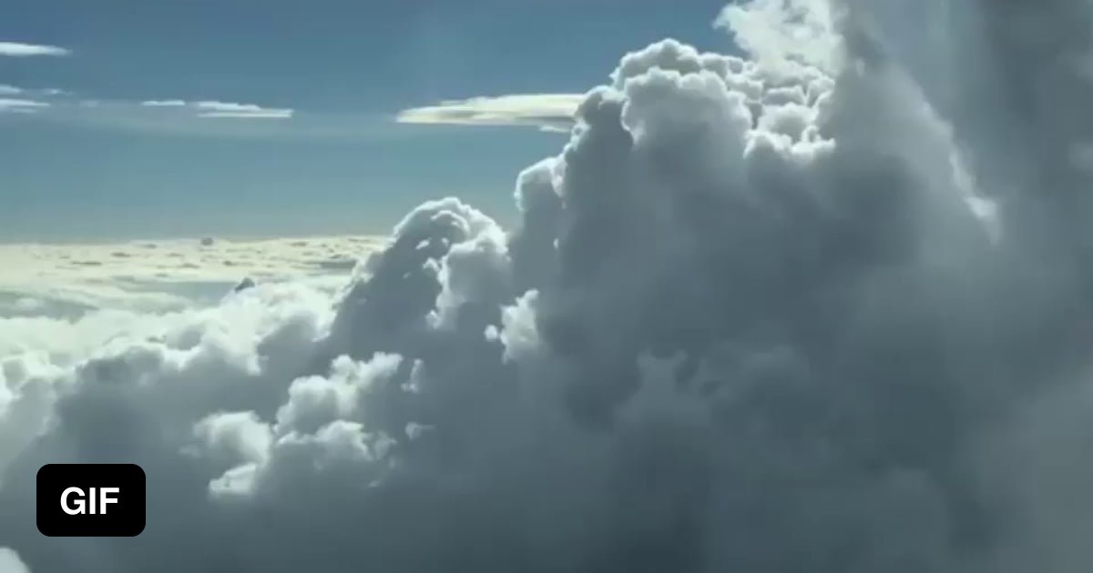 Flying through a gap in the clouds - 9GAG