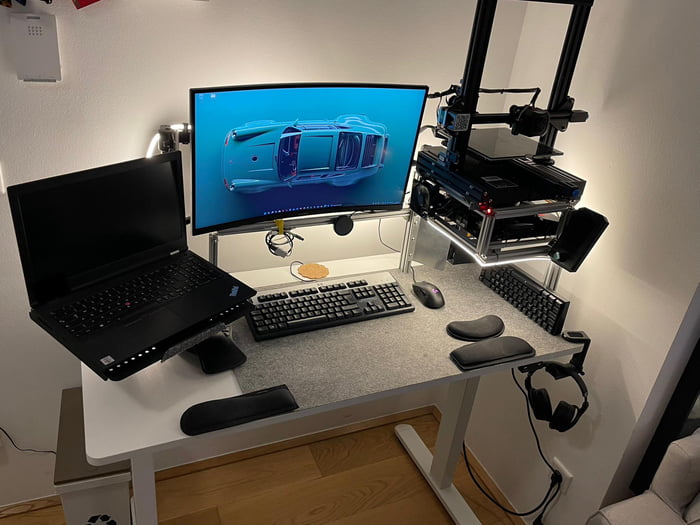 Small desk setup with a 3-legged PC V2 with a printer on top - 9GAG