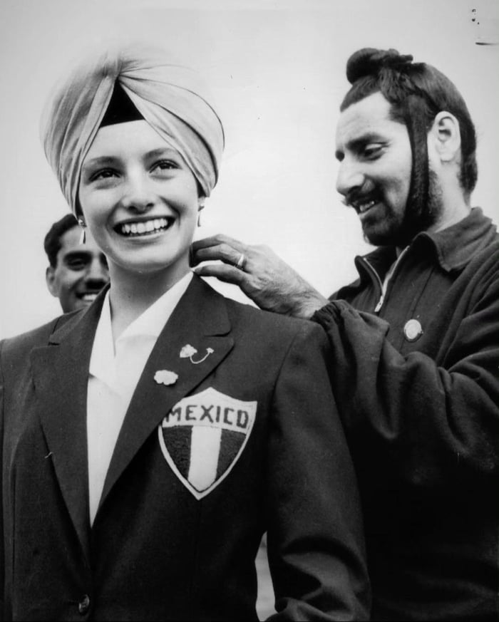 Picture of Indian hockey team coach Baldev Singh tying a turban on ...