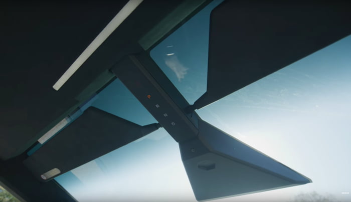 The overhead touch shifter in the cybertruck that replaces a rear view ...