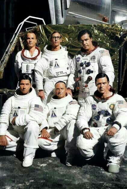 Neil Armstrong and his team pose in front of their spacecraft in 1969 ...