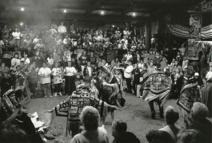 Indigenous people dance at a potlatch hosted by Chief Roy Cranmer of ...