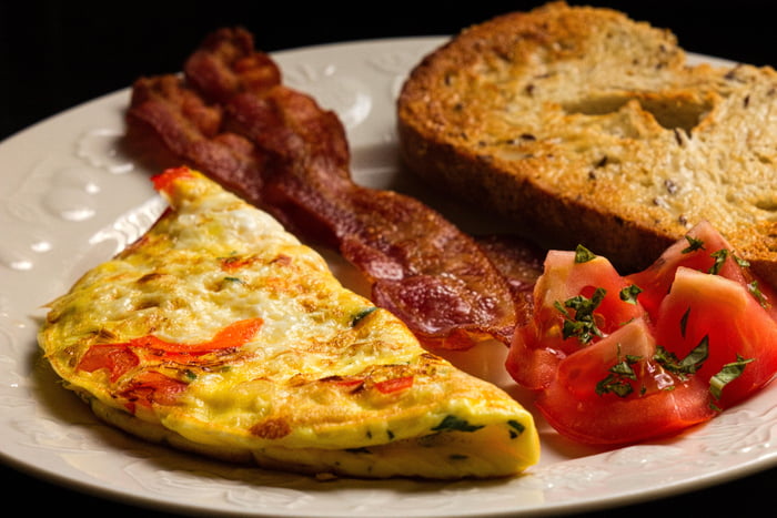 Lunch for one. Eggs with Red pepper, Green onion and fresh Tarragon ...
