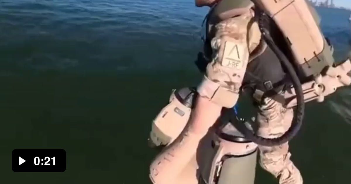 The British Royal Navy using jet suits to fly around HMS Elizabeth as it enters New York harbor ...